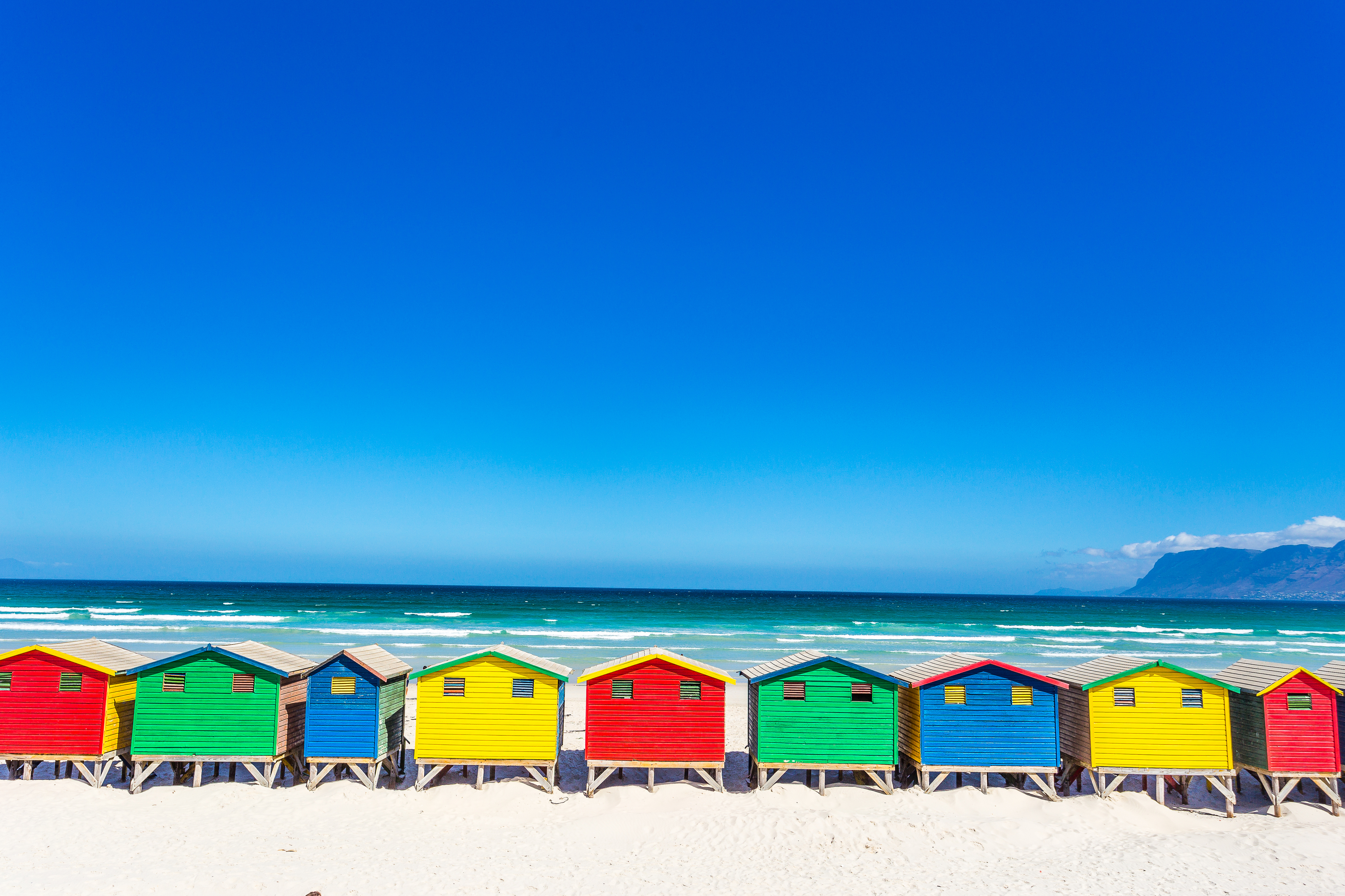 Colorful shacks in Muizenberg Beach | HT Brand Studio